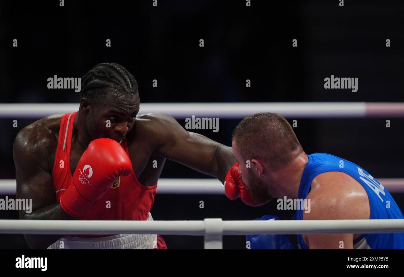 Paris, France. 29 July, 2024. Nelvie Raman Tiafack (Germany) and Mahammad Abdullayev (Azerbaijan ...