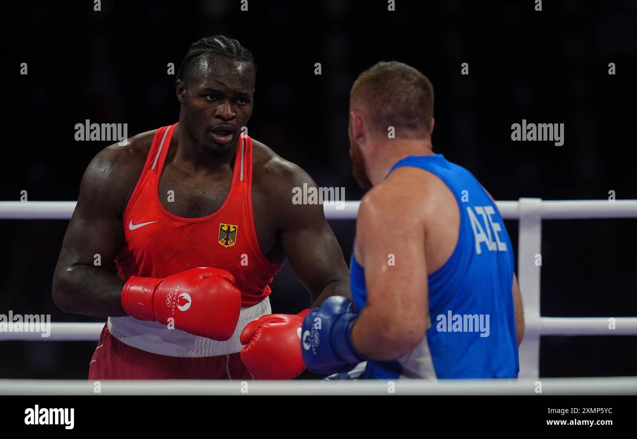 Paris, France. 29 July, 2024. Nelvie Raman Tiafack (Germany) and Mahammad Abdullayev (Azerbaijan ...