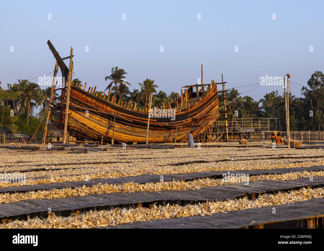 Moon fishing boat building in front of dried fishes, Chittagong ...