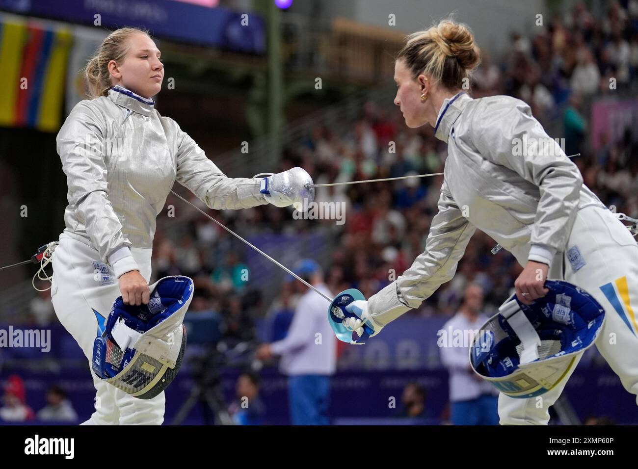 Ukraine's Olga Kharlan, right, prepares to compete with Azerbaijan's ...