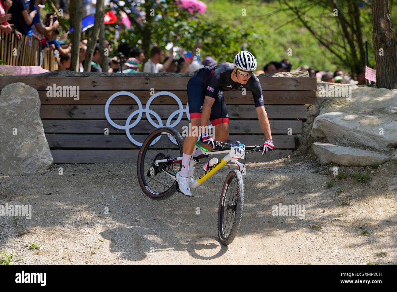 Charlie Aldridge, of Britain, competes in the men's mountain bike race ...