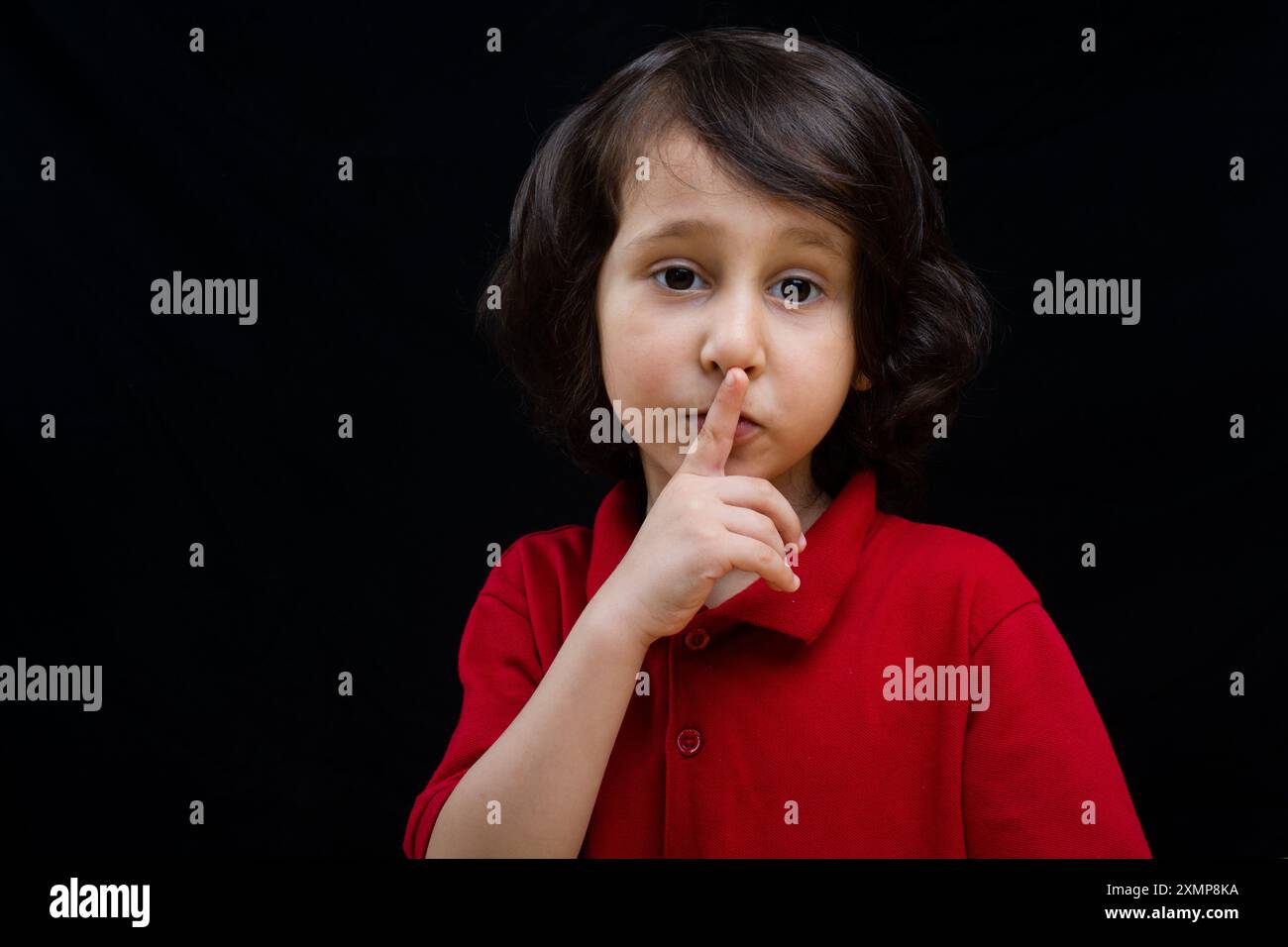 Finger over lip hi-res stock photography and images - Alamy