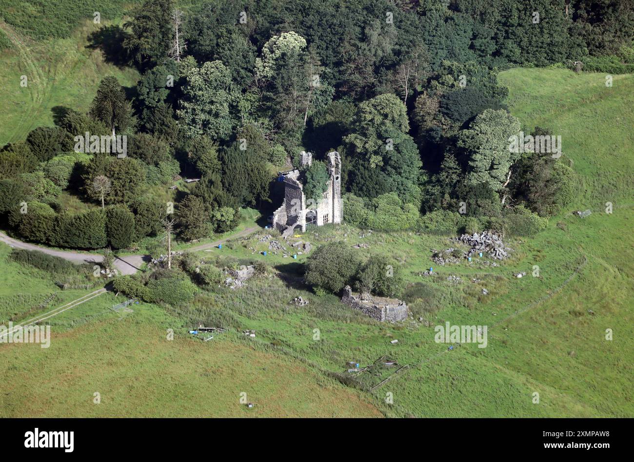 aerial view of a ruined castle or derelict stone house at Warley Moor ...