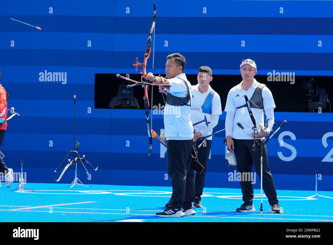 Taiwan's Tai Yu-Hsuan shoots during the men's team quarterfinals ...