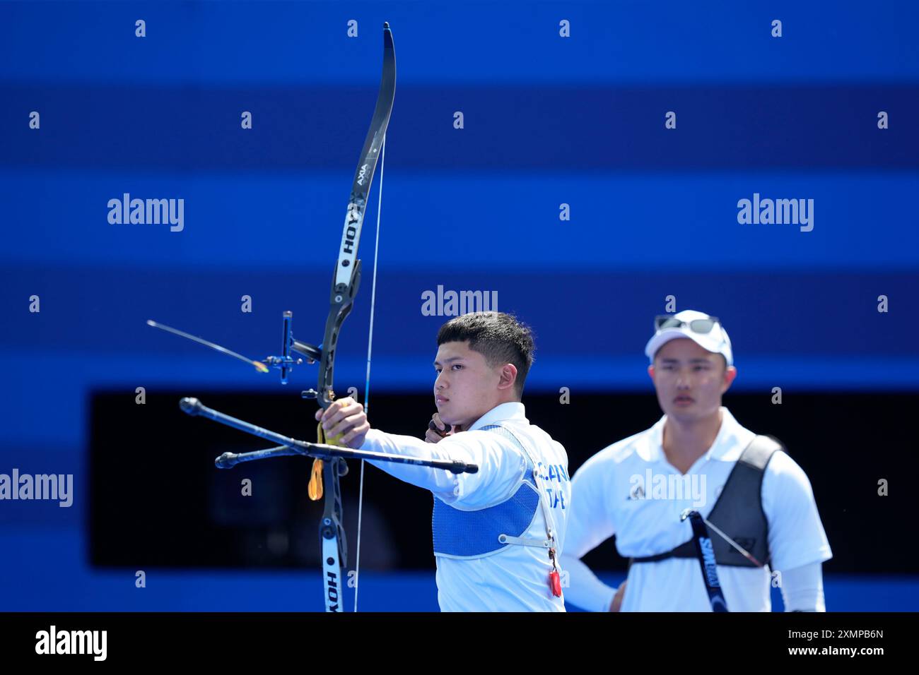 Taiwan's TANG Chih-Chun shoots during the men's team quarterfinals ...