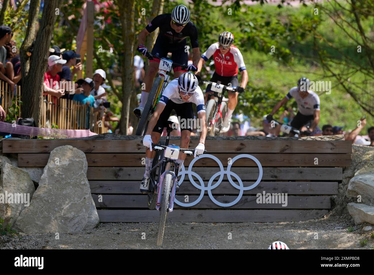 Riley Amos, of United States, competes in the men's mountain bike race ...