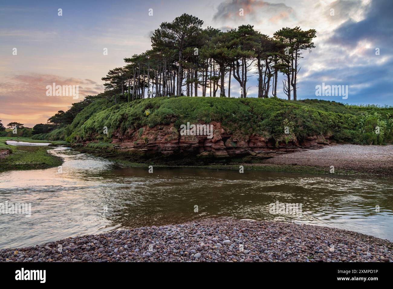 Sunrise at the Otter Estuary, part of the Jurassic Coast UNESCO site ...