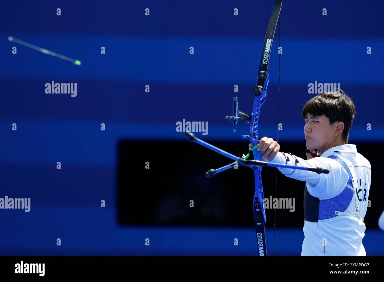 South Korea's Je Deok Kim shoots during the men's team quarterfinals ...