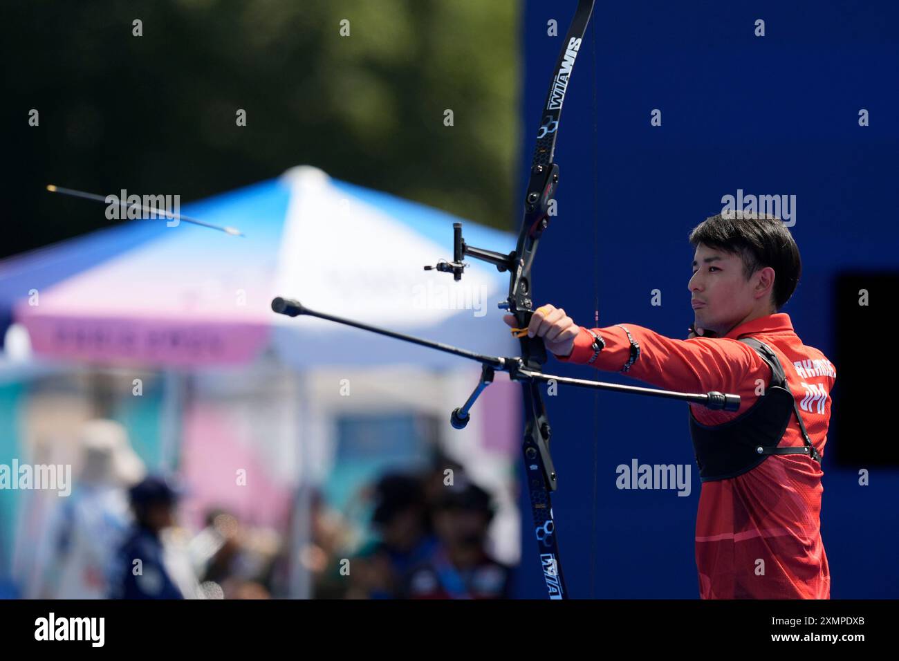 Japan's Junya Nakanishi shoots during the men's team quarterfinals Archery competition against ...