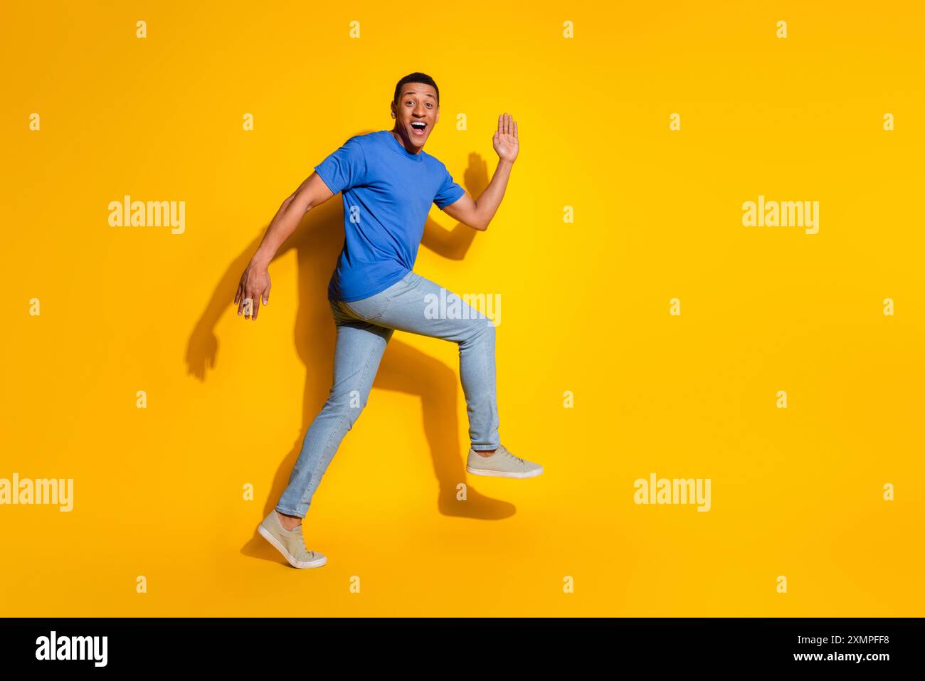 Full size photo of pretty young male running excited wear trendy blue ...