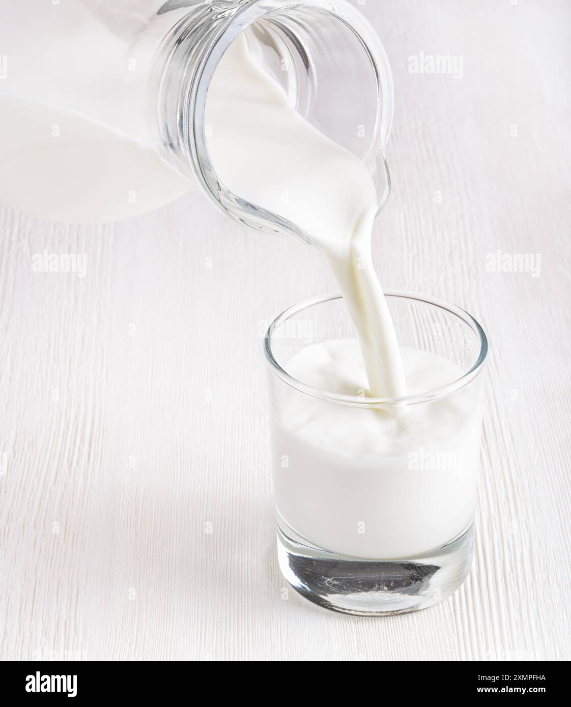 Milk splashing on glass wood hi-res stock photography and images - Alamy