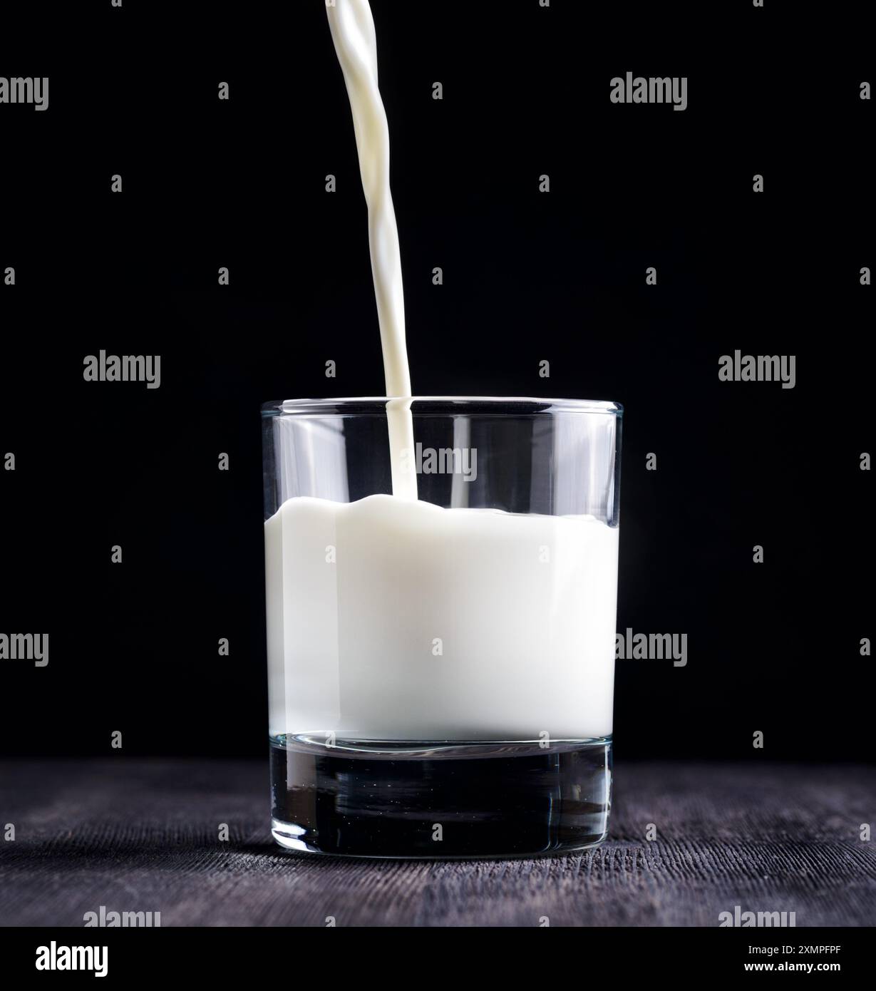Pouring milk glass healthy dairy hi-res stock photography and images ...