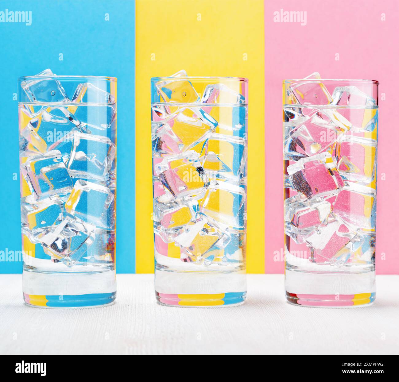 Three glasses on colorful background. Vintage style Stock Photo - Alamy