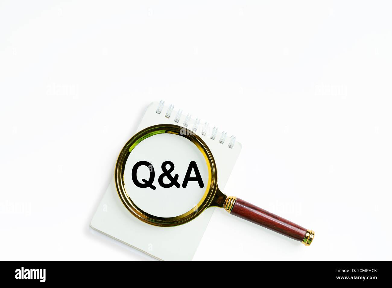 Magnifying glass word questions Cut Out Stock Images & Pictures - Alamy