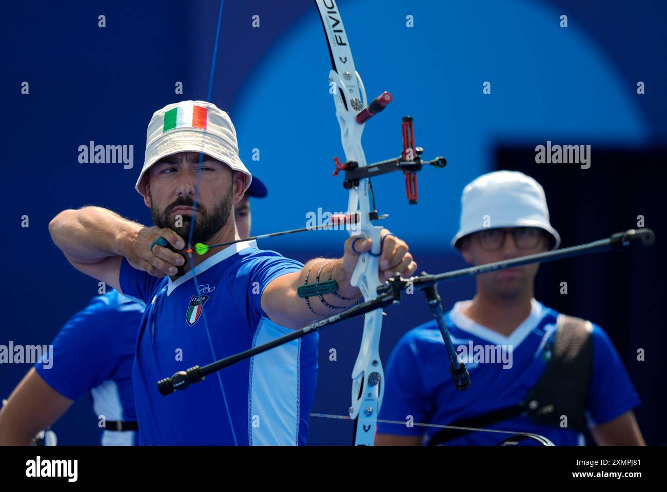 Italy's Mauro Nespoli shoots during the men's team quarterfinals ...
