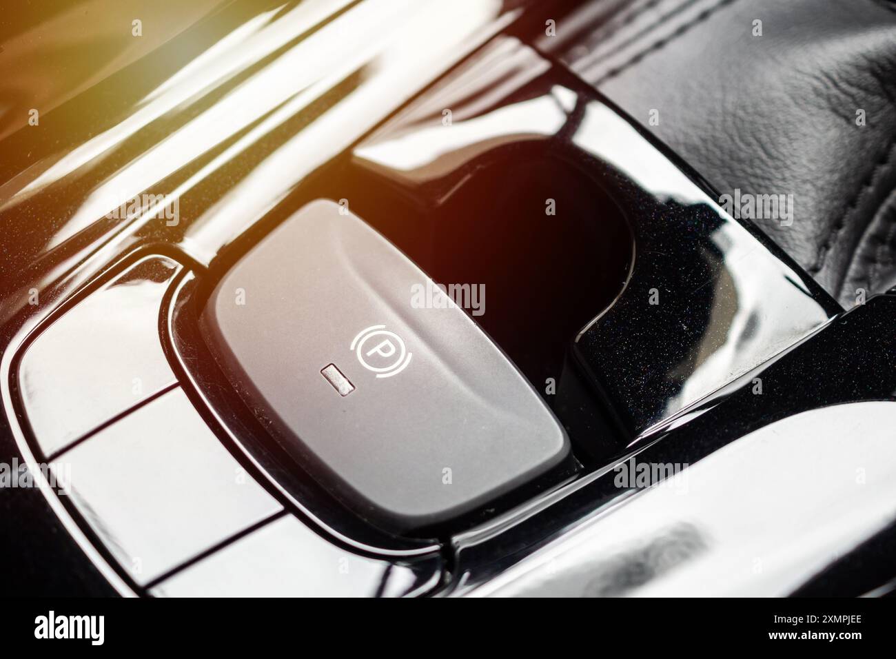 electronic handbrake button in luxury modern car Stock Photo - Alamy