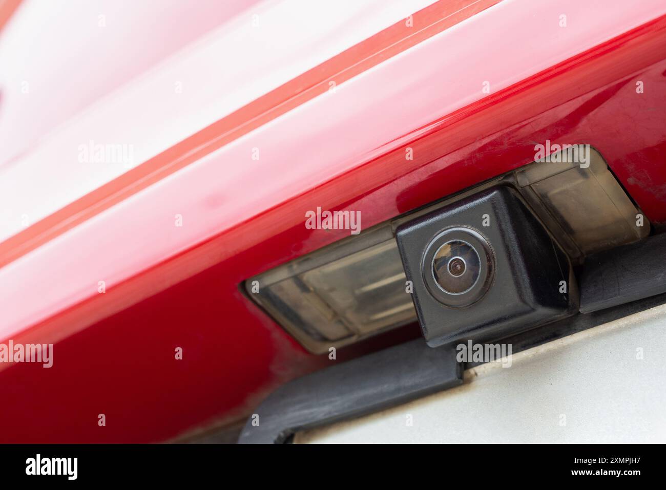 Red car rear view camera close up for parking assistance Stock Photo ...