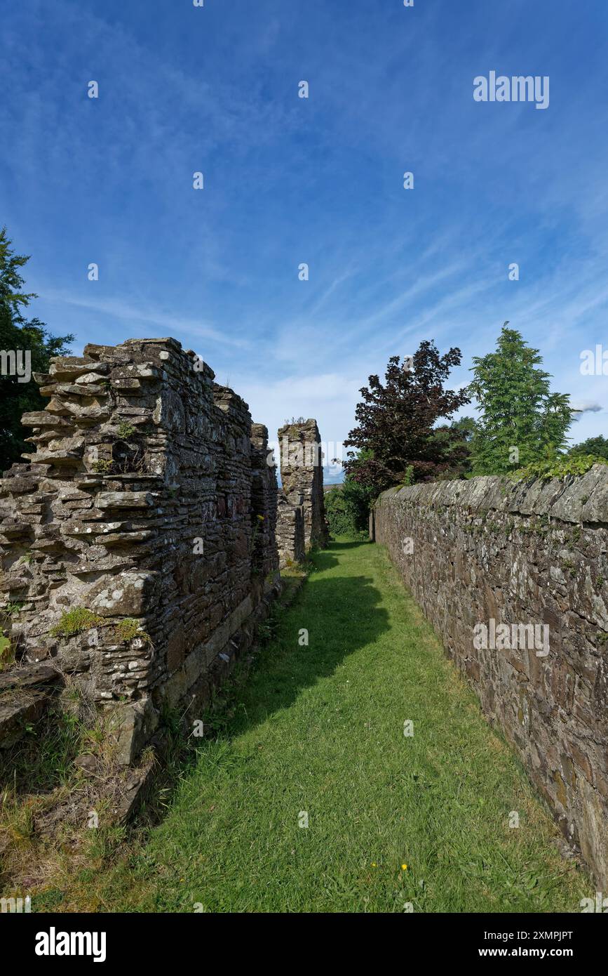 The edge of Balmerino Priory close to a Village Stone Wall, with the ...