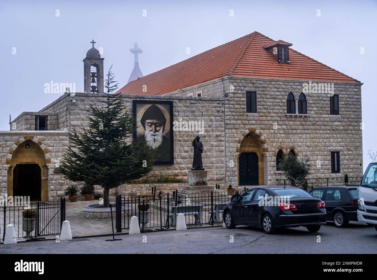 Saint Maron-Annaya monastery (Monastery Saint Maroun) with St. Charbel image and sculpture in ...
