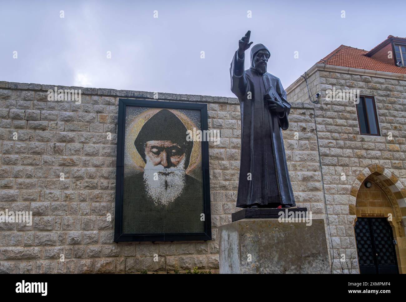 Saint Maron-Annaya monastery (Monastery Saint Maroun) with St. Charbel image and sculpture in ...