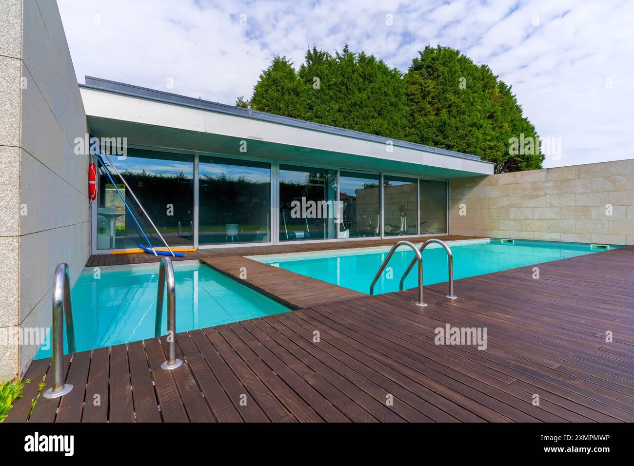 Two small Pools with wooden floors nearly gym building Stock Photo - Alamy