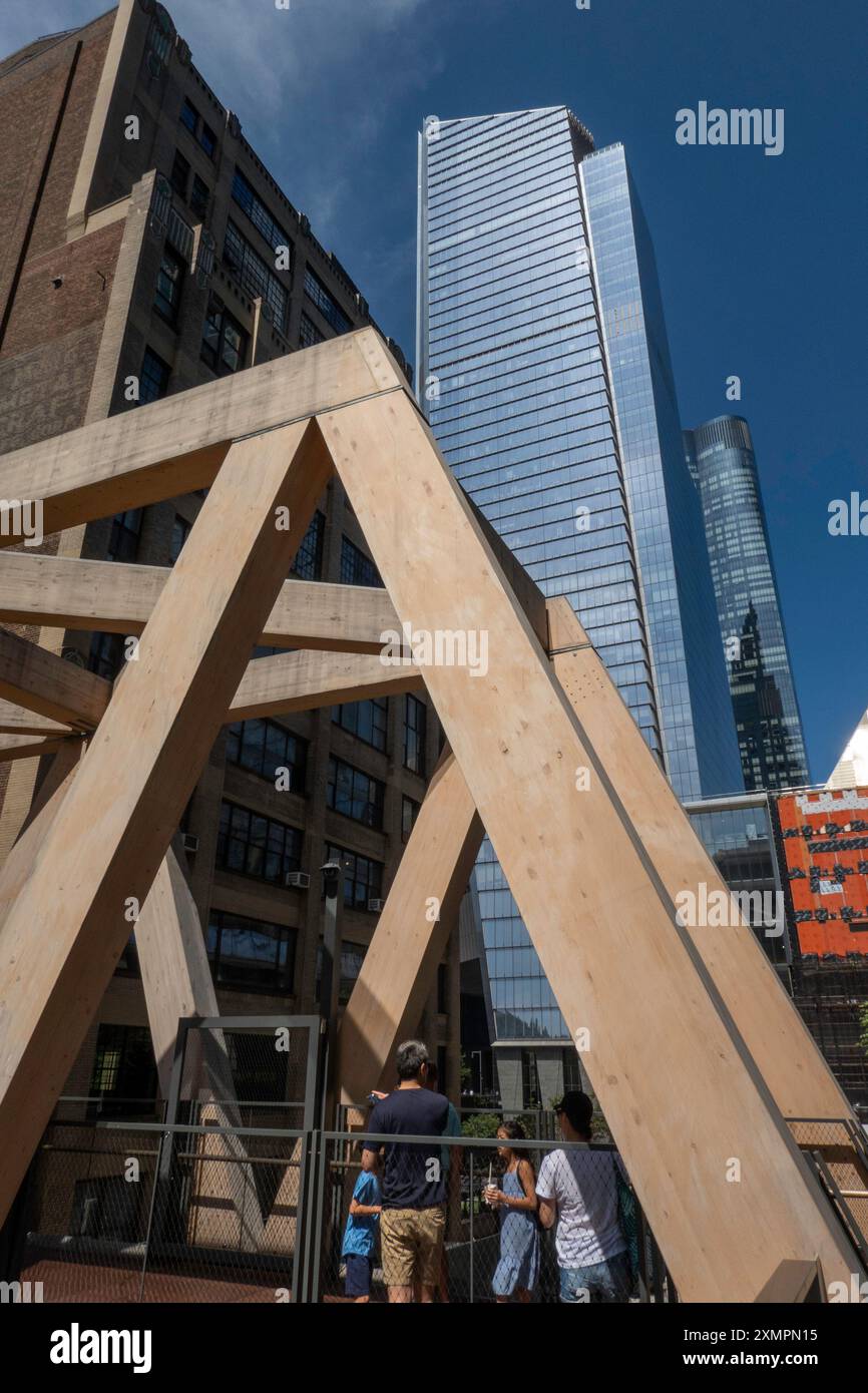 The Timber Bridge is a composite wooden bridge located in Hudson Yards ...