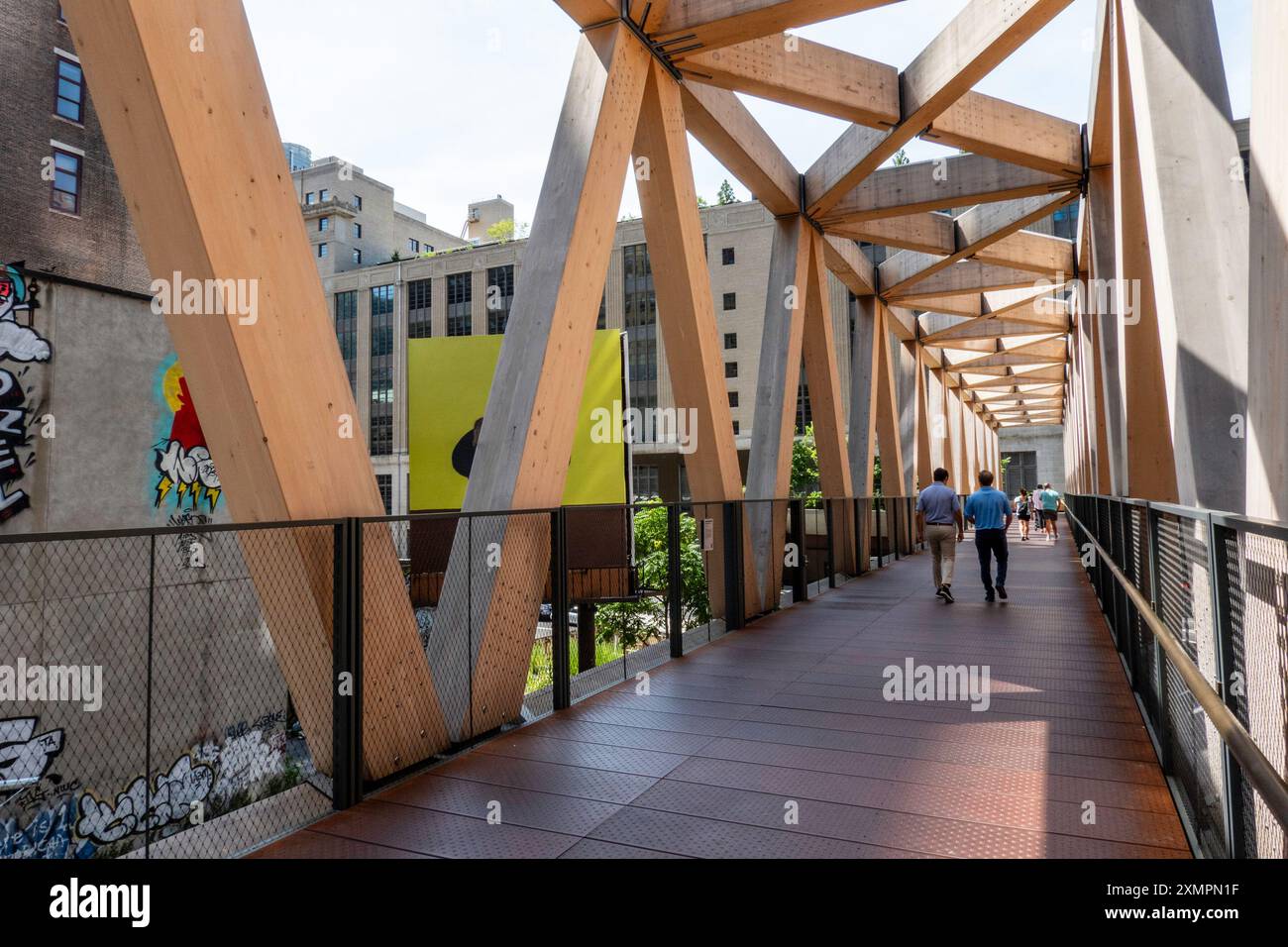 The Timber Bridge is a composite wooden bridge located in Hudson Yards ...