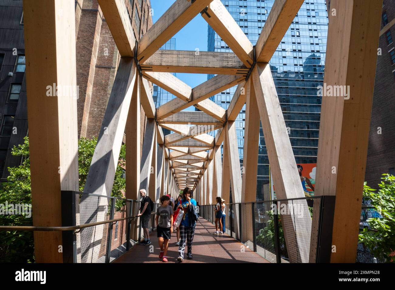 The Timber Bridge is a composite wooden bridge located in Hudson Yards ...