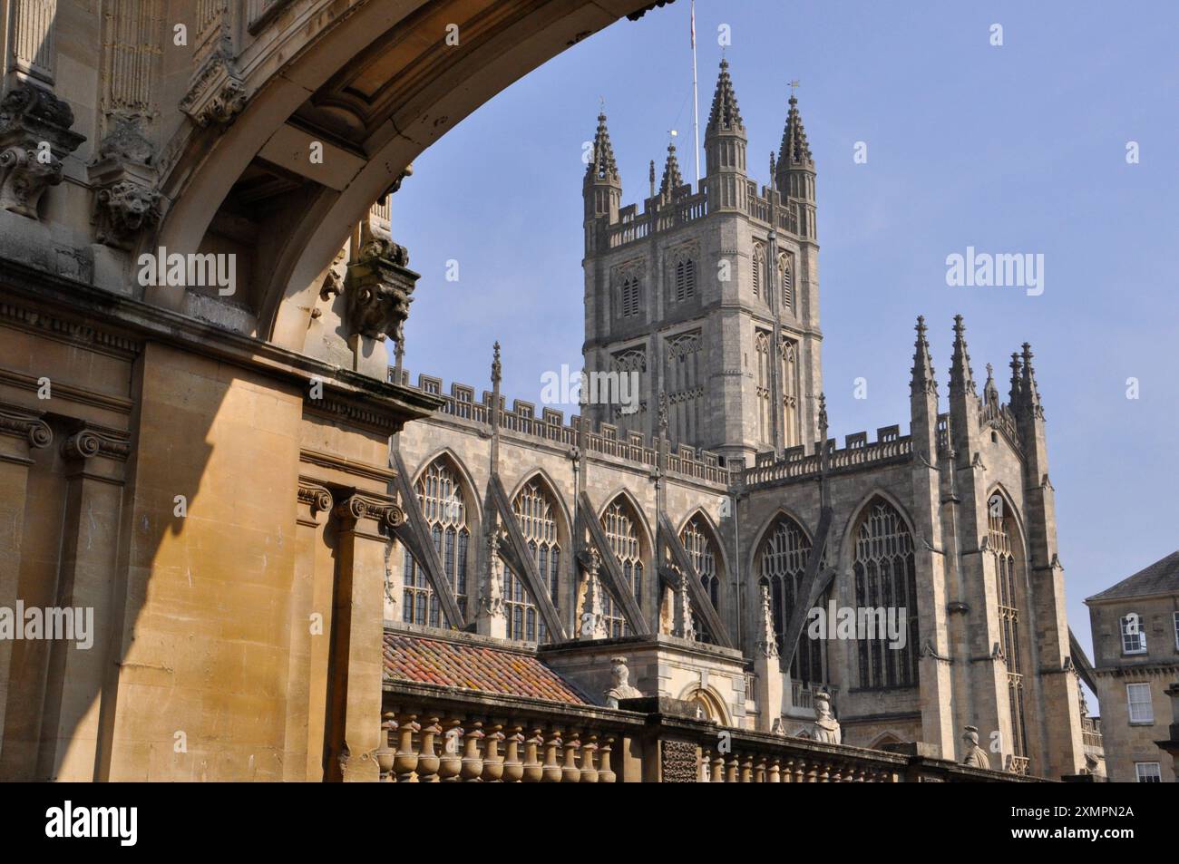 Bath Abbey, viewed through the ornate arch on York Street. Part of the ...