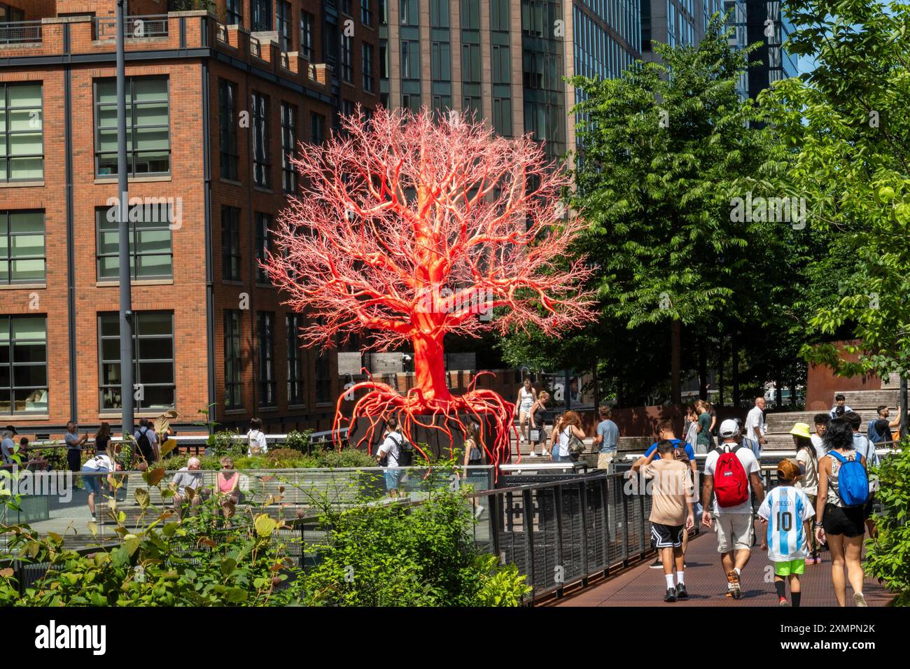 The old tree is a pink and red 25 foot tall sculpture comprised of man ...