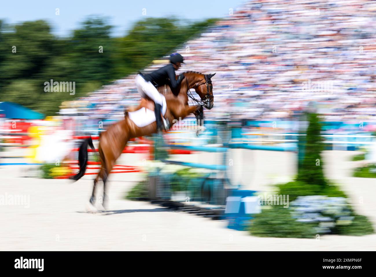 Tim Price of New Zealand and horse Falco compete during the Eventing ...