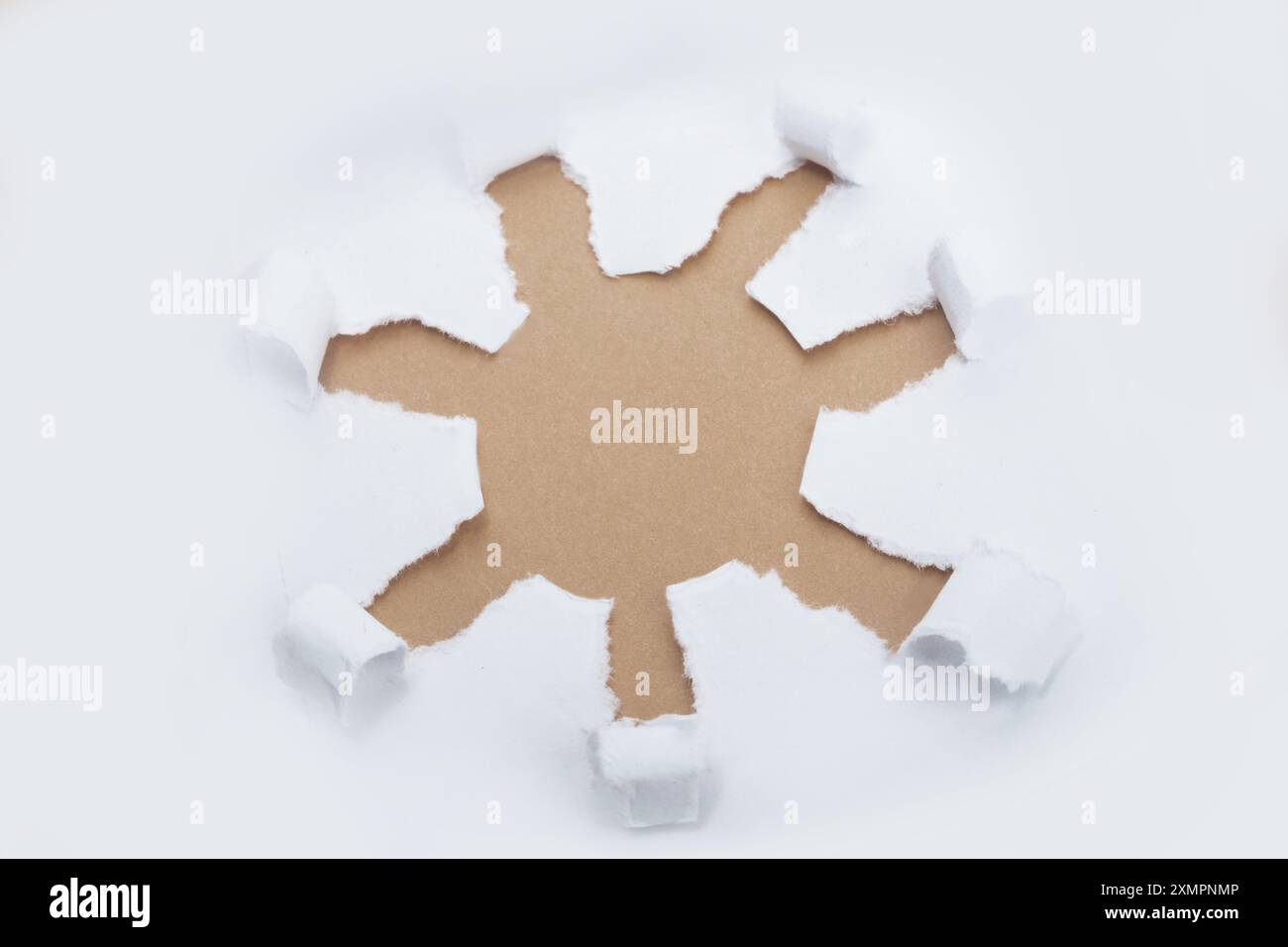 Sun shape made through torn paper in white background Stock Photo - Alamy
