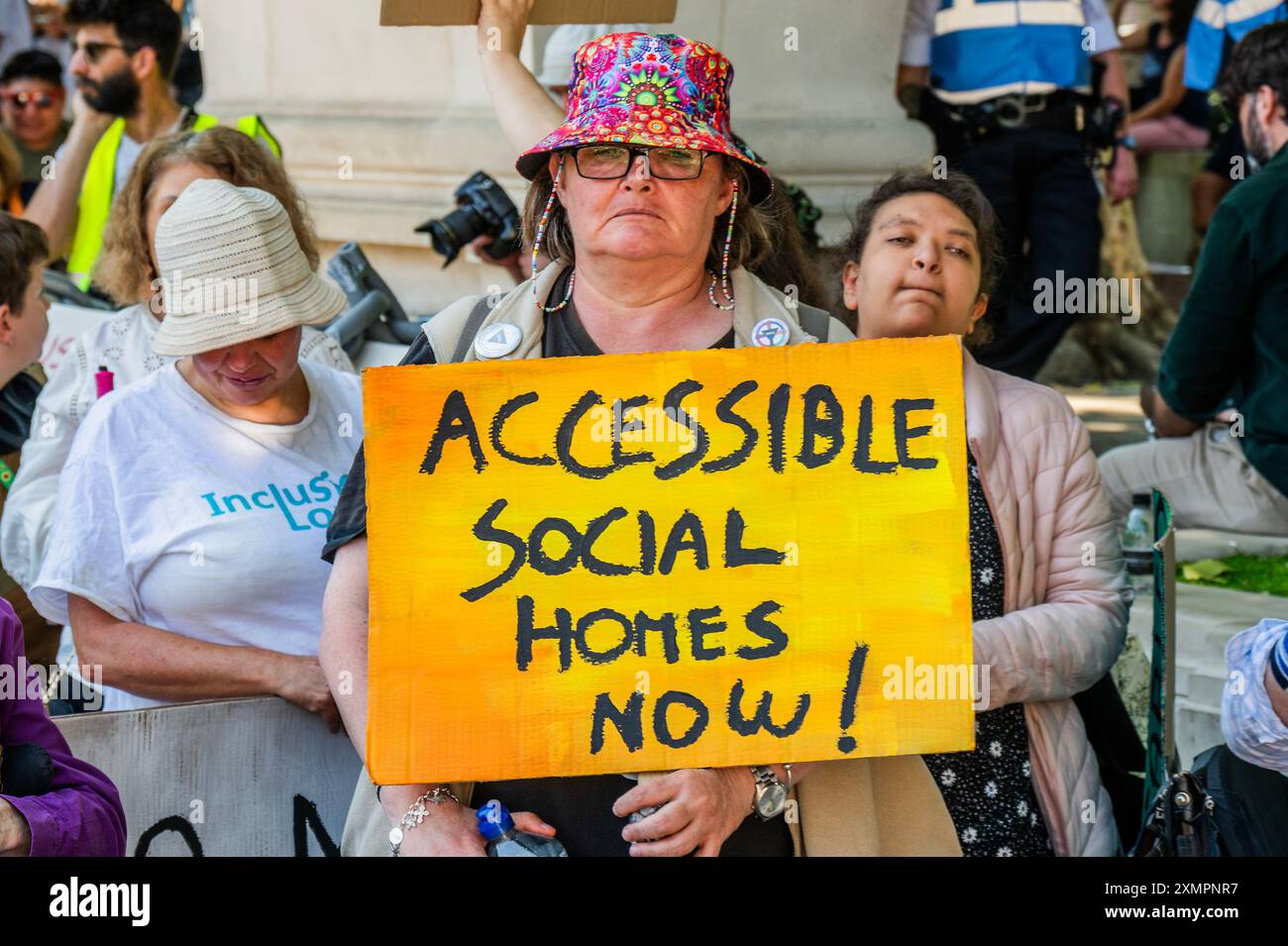 London, UK. 29th July, 2024. A protest calling for accessible housing ...