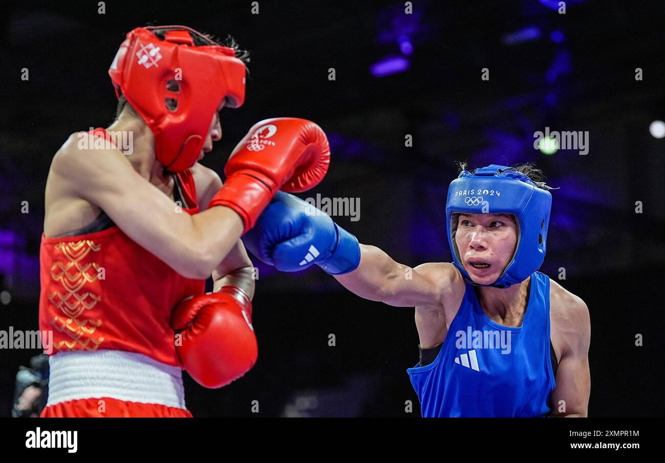 Paris, France. 29th July, 2024. Yang Wenlu (L) of China competes ...