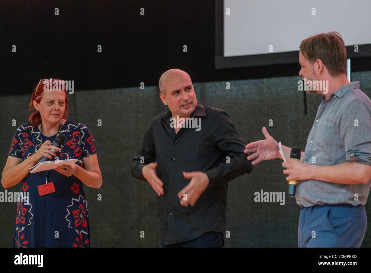British film director and screenwriter Peter Strickland (centre ...