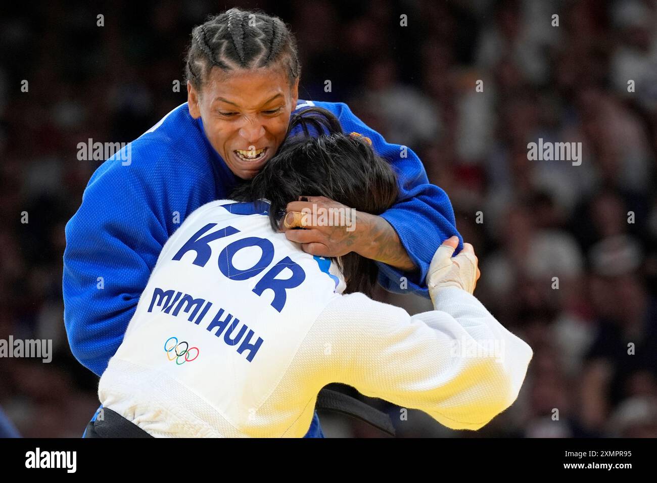 South Korea's Mimi Huh and Brazil's Rafaela Silva compete during their ...