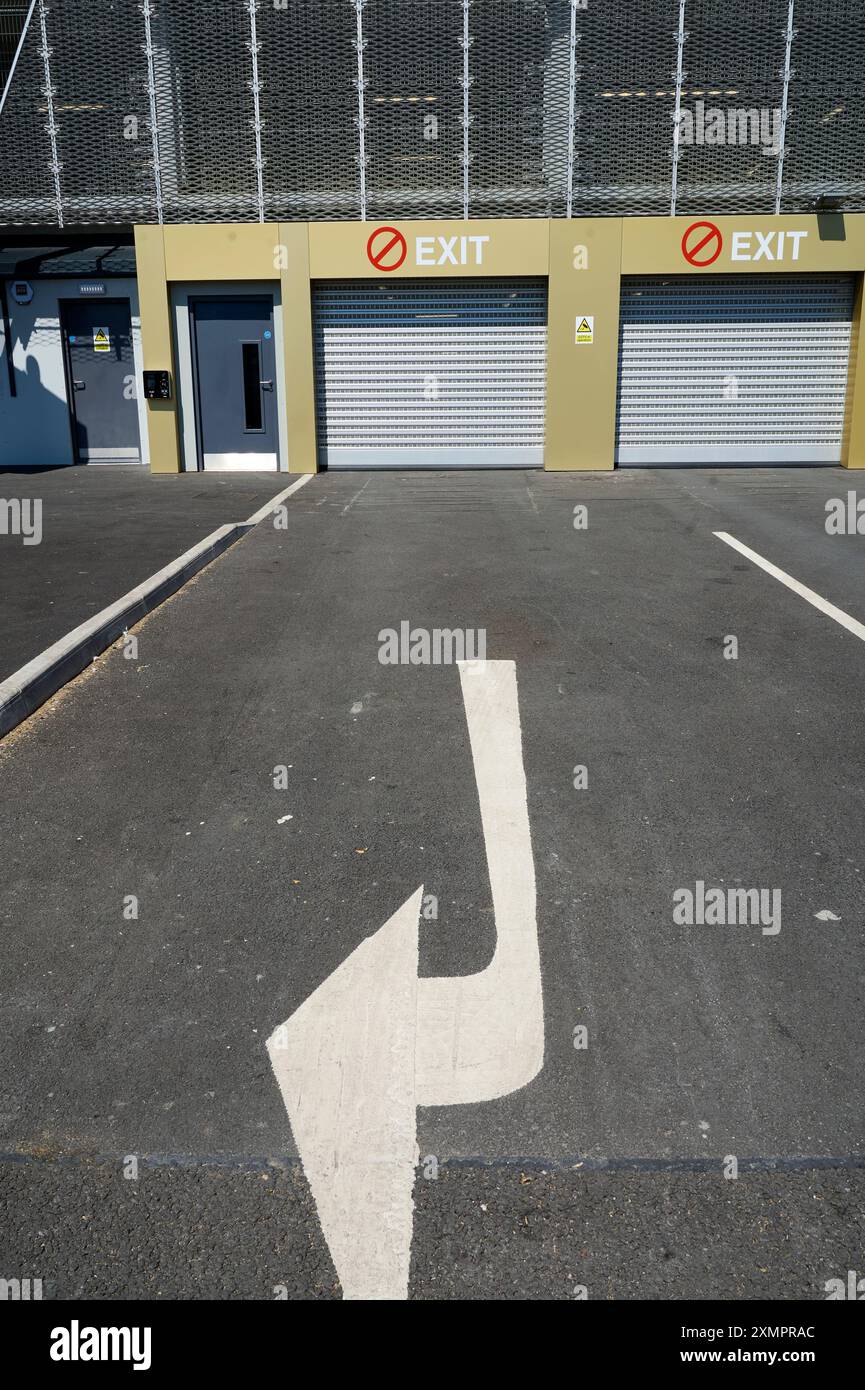 Shuttered door from the new Blackpool Central multi-storey car park and direction arrow Stock ...