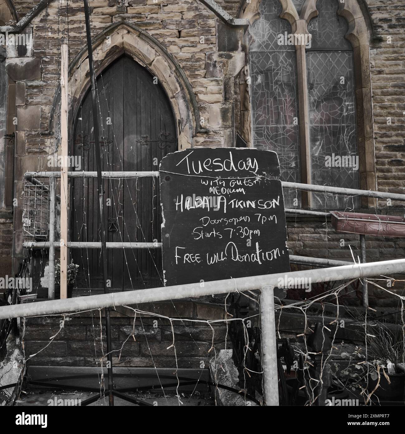 Hand written chalkboard in front of spiritualist church Stock Photo - Alamy