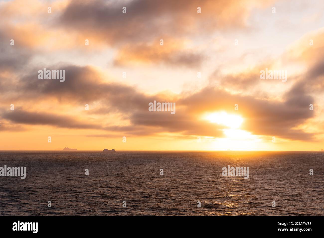 Beautiful sunset clouds over ocean hi-res stock photography and images ...