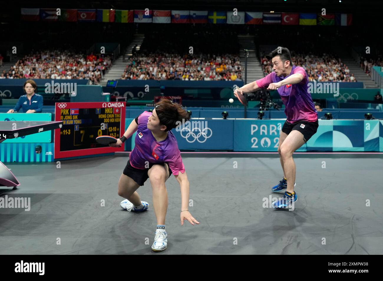 Hong Kong's Wong Chun Ting, right, with his teammate Doo Hoi Kem, plays ...