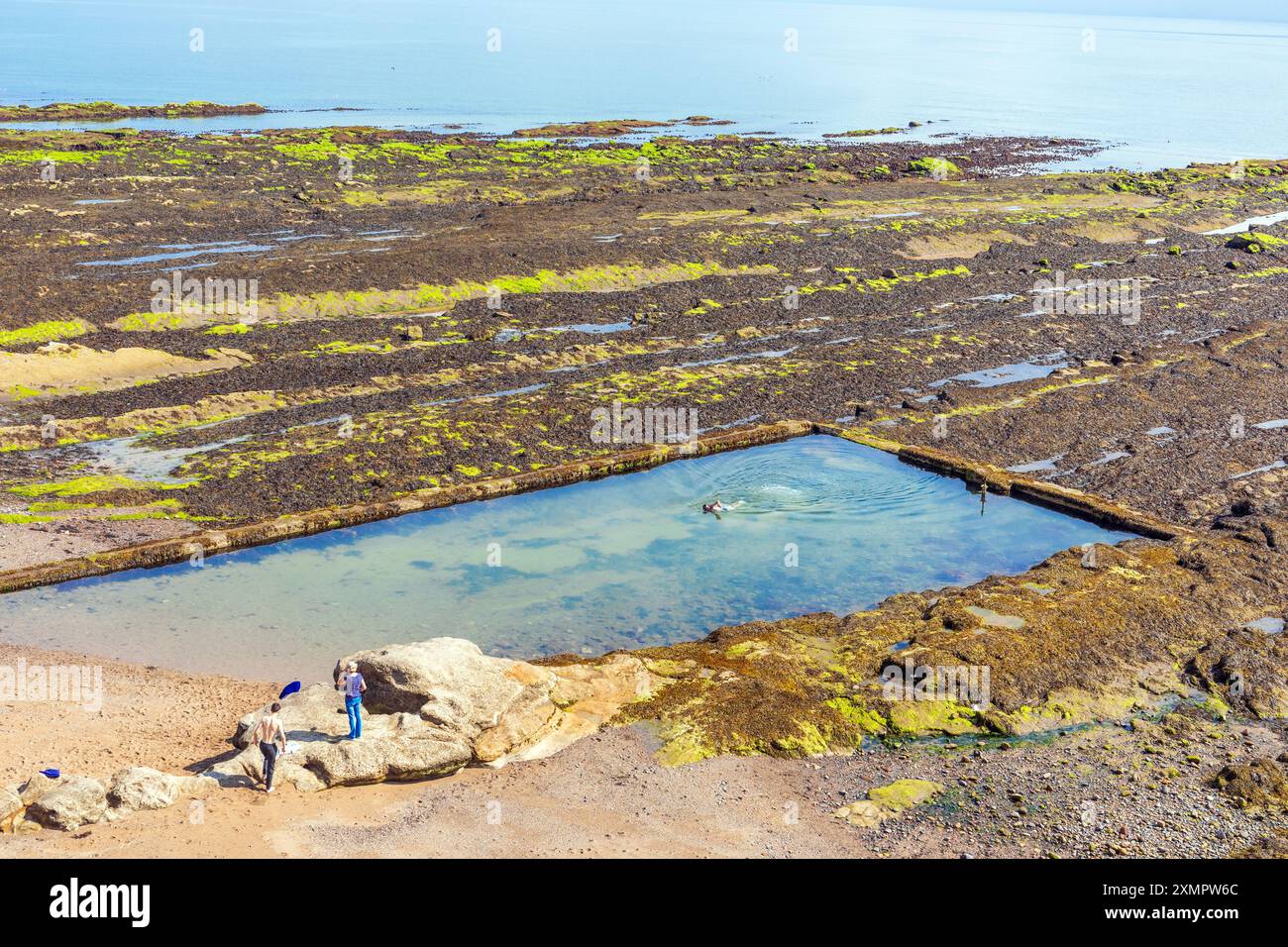 Open sea filled swimming pool created in the rocky shore at Castle ...