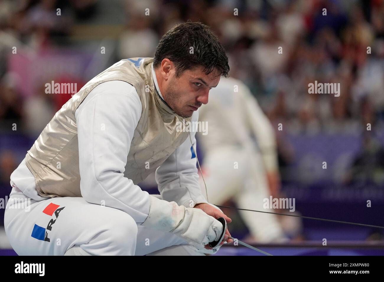 France's Maxime Pauty reacts after loosing the men's individual Foil ...
