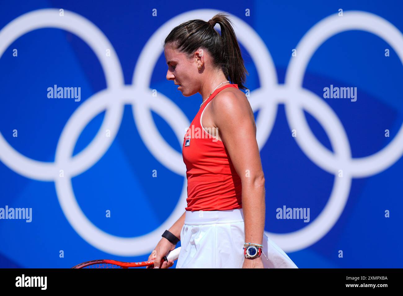 Emma Navarro of the United States walks by the Olympic Rings as she ...