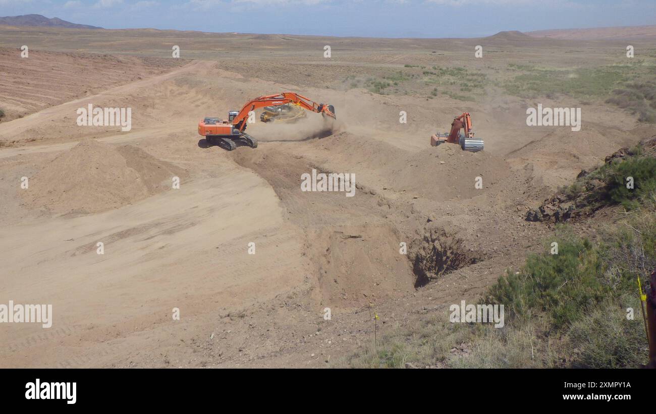 hitachi excavator at a construction site, heavy machinery for ...