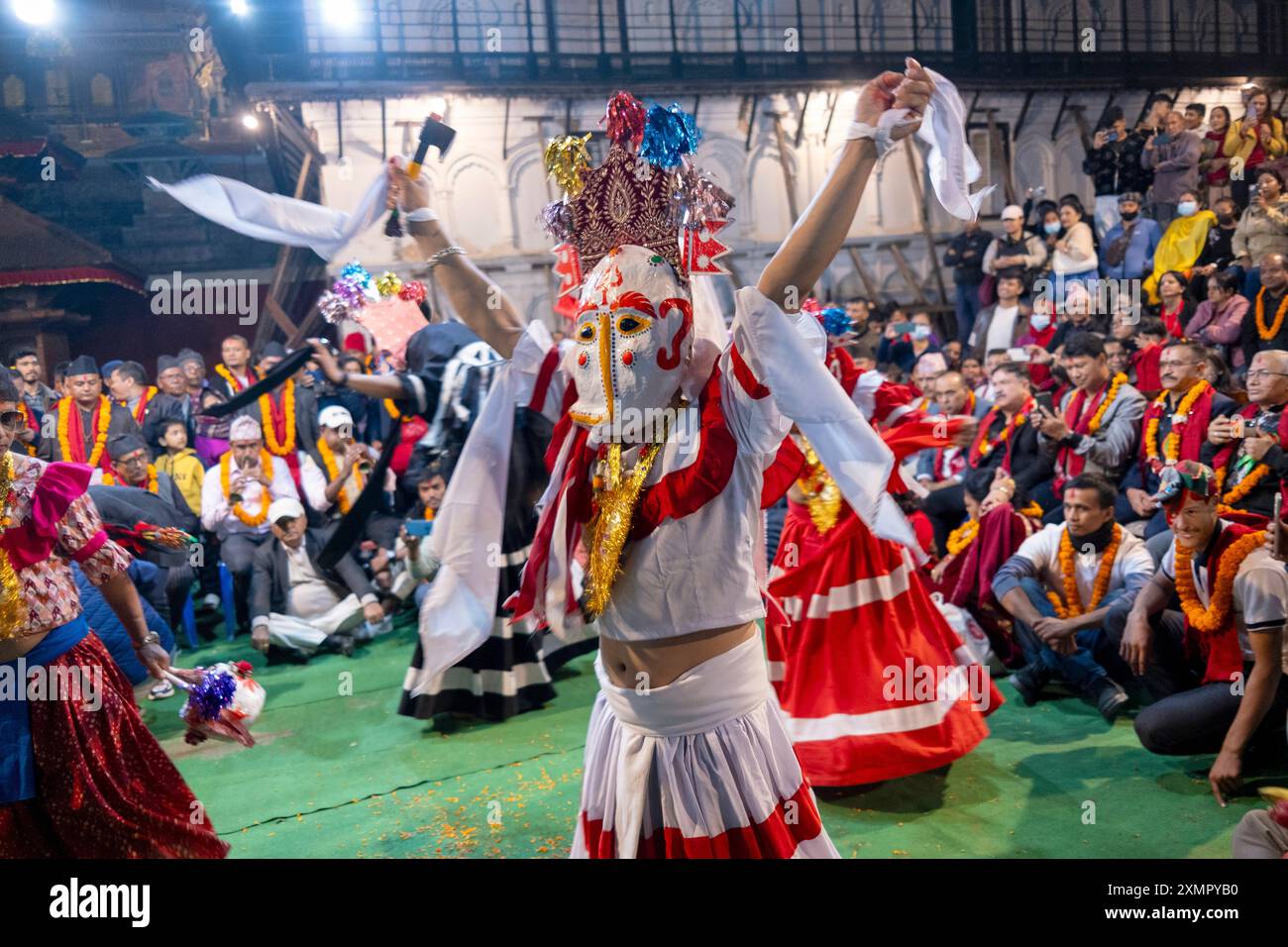 Traditional male Nepalese dancers representing female goddesses ...