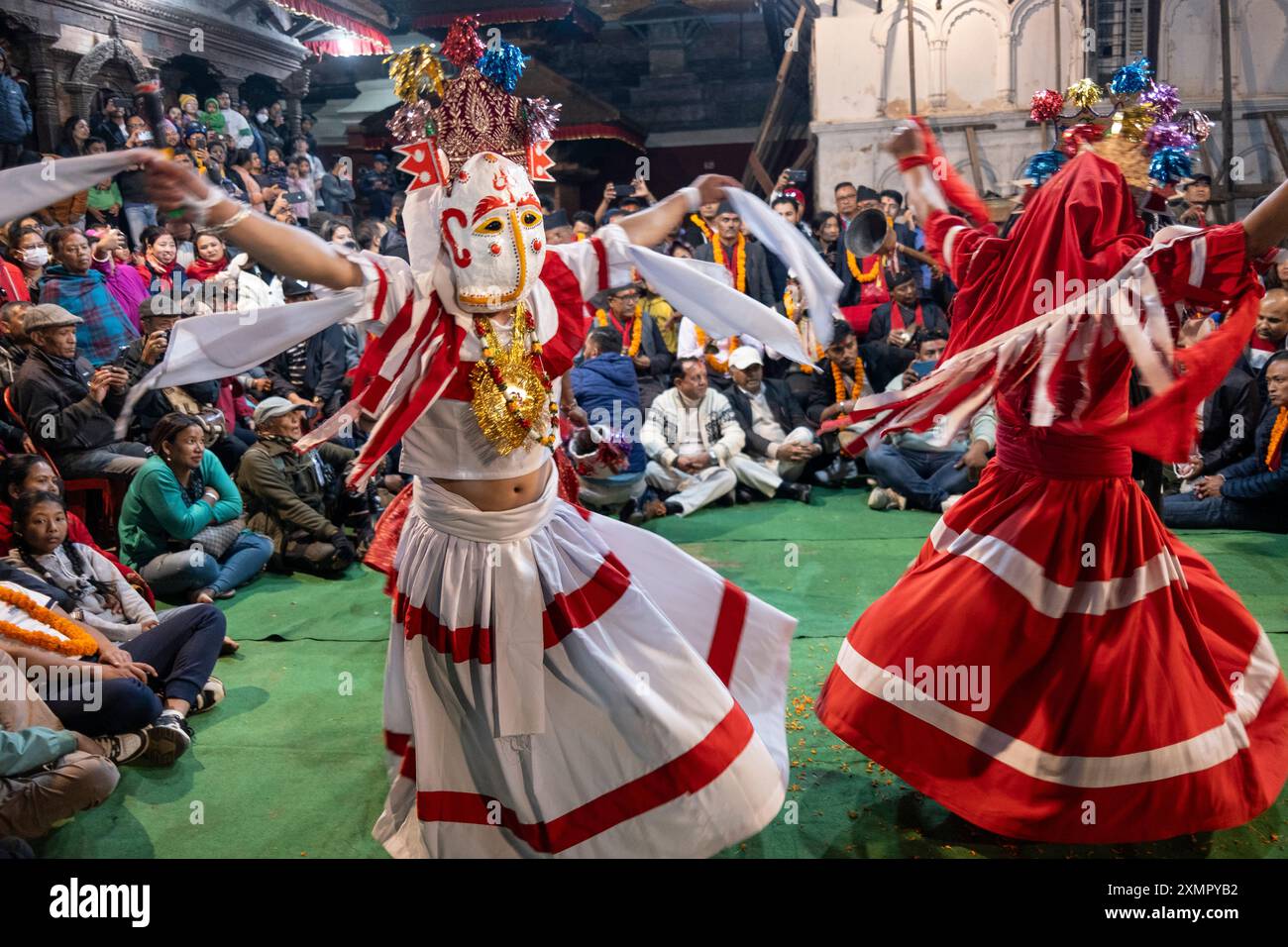 Traditional male Nepalese dancers representing female goddesses ...
