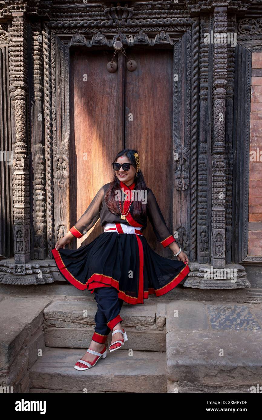 Young women of the Newari ethnic group dressed in traditional costumes ...