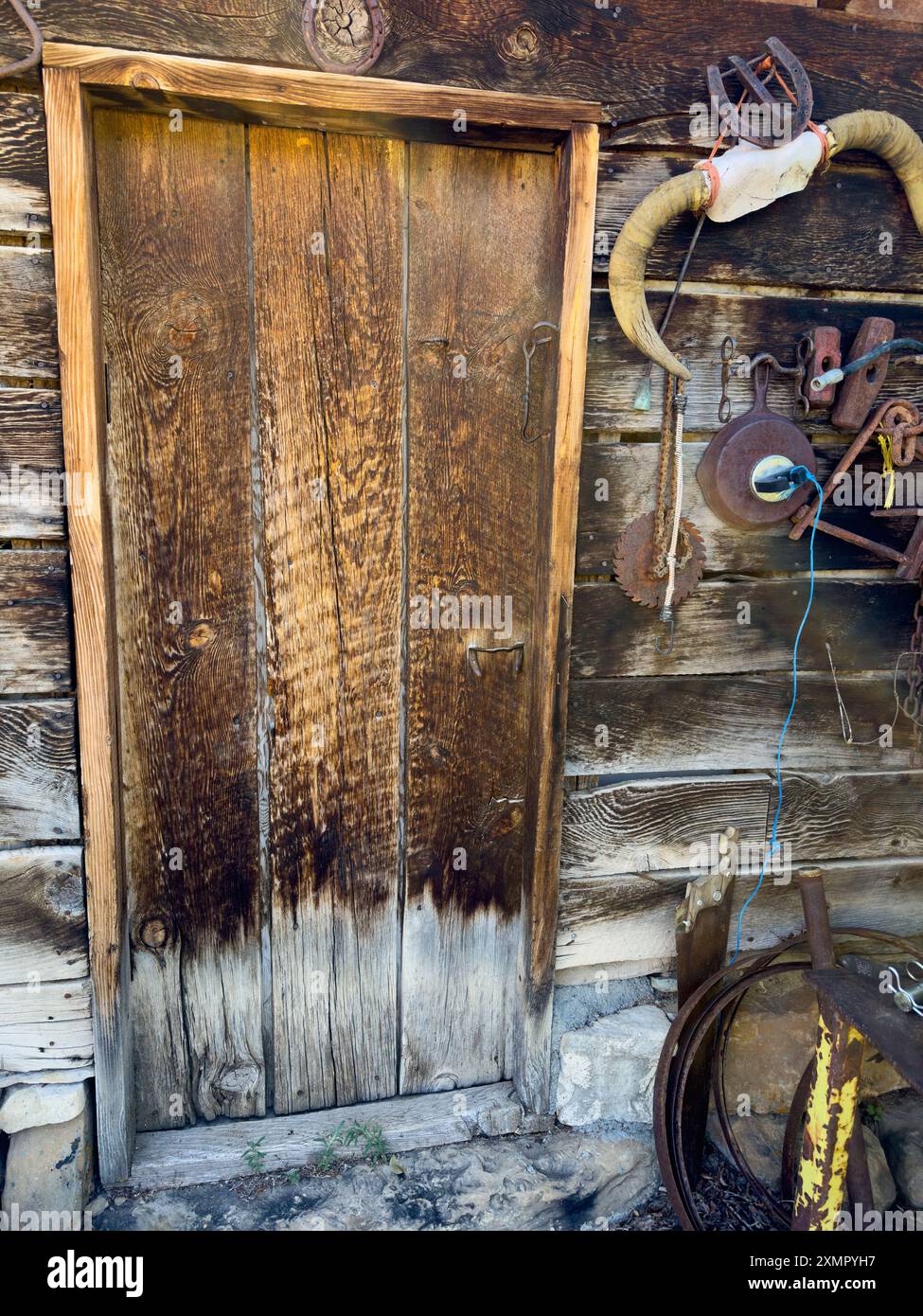 Antique memorabilia on the wall of a 19th Century cabin on the Nine ...