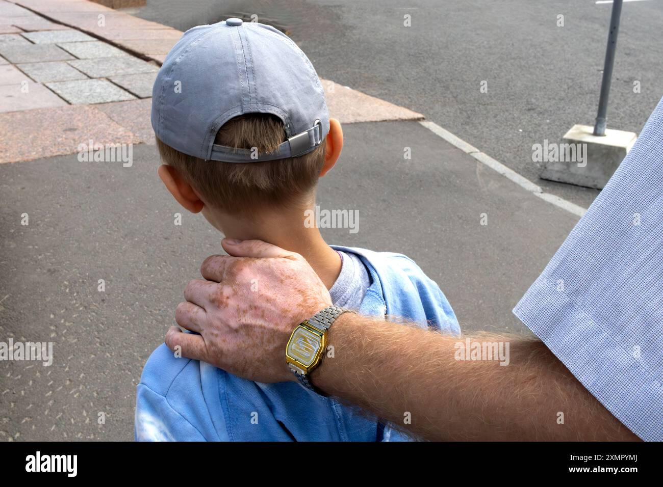 Fathers hand on sons shoulder hi-res stock photography and images - Alamy