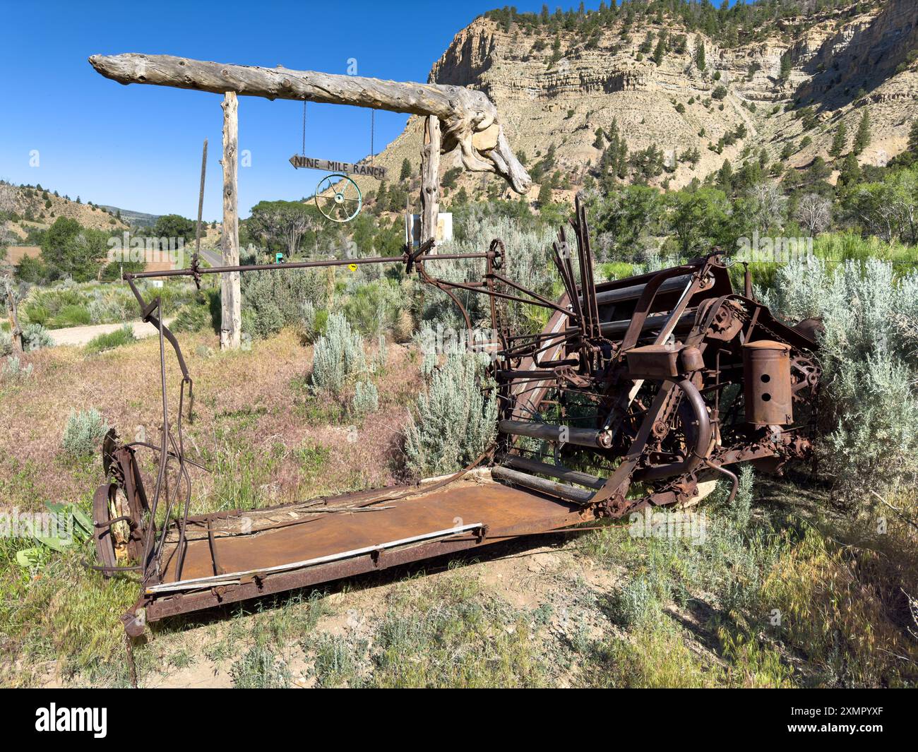 An antique grain binder or reaper-binder at the Nine Mile Ranch in Nine ...